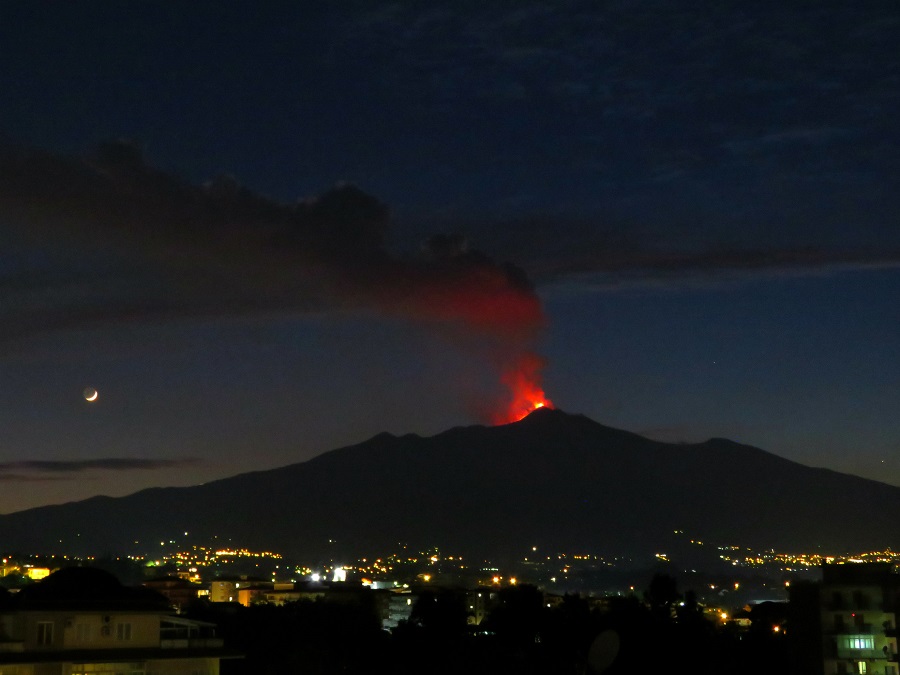 How do people live near an active volcano?